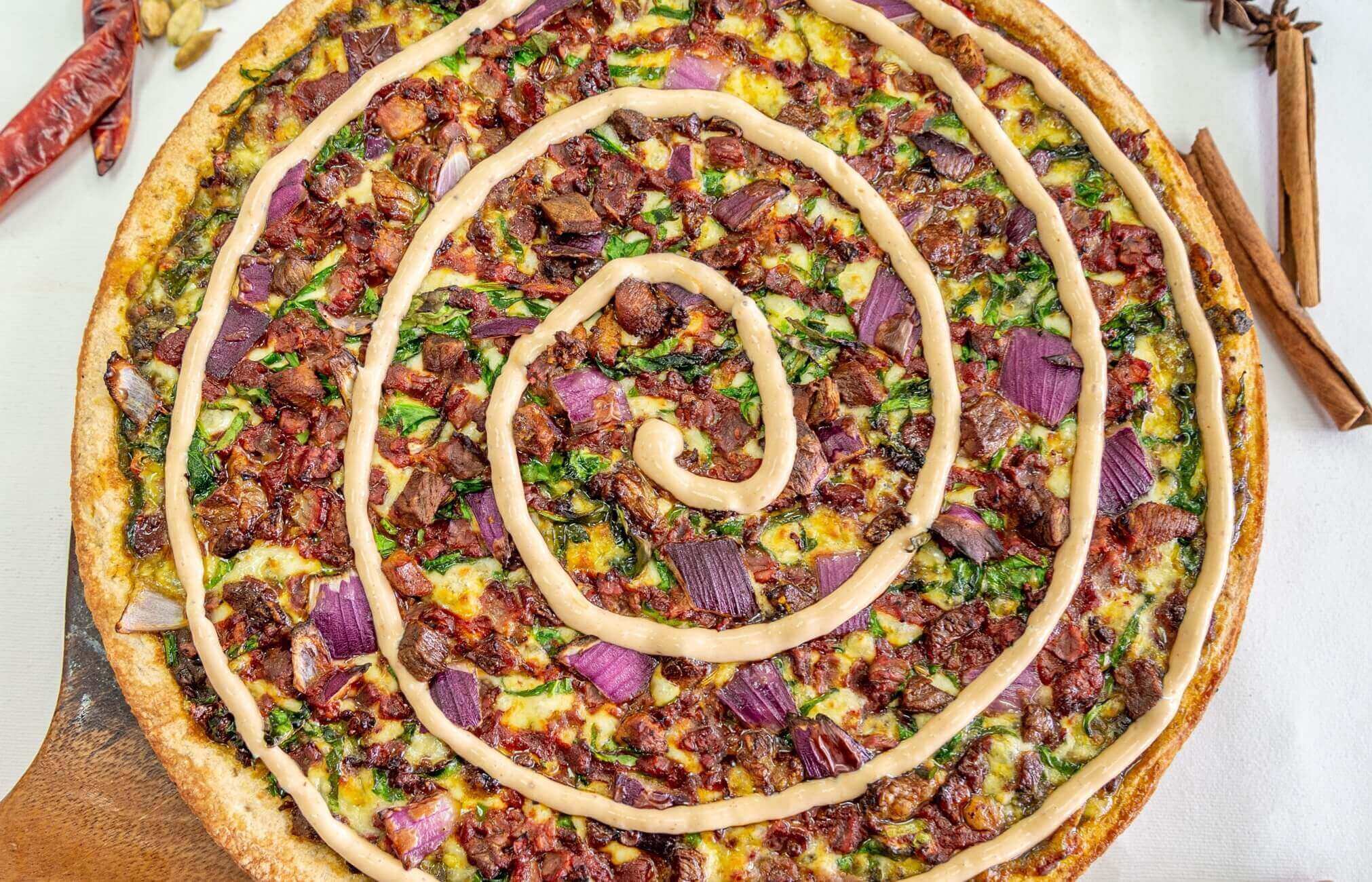 Currizza – Spice on a Slice – Wellington Pizza